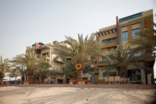 Visit Khiran Resort Beach in Al Khiran | Expedia