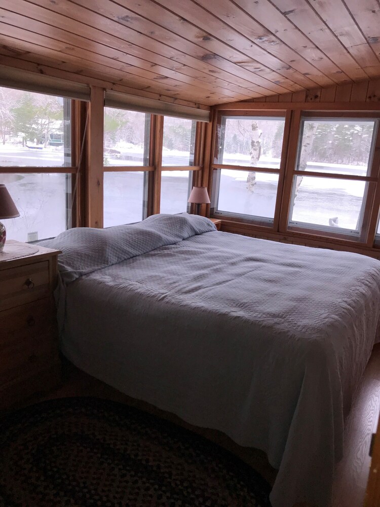 Beautiful Lakefront Cottage with private dock - Stoneham | Vrbo