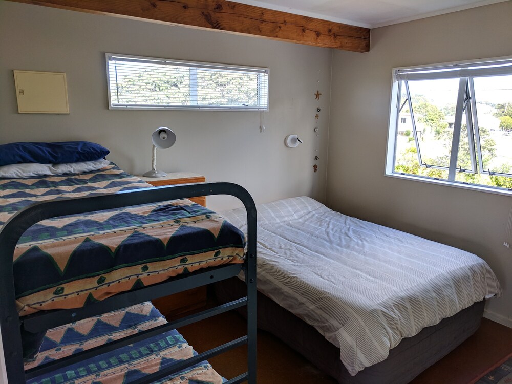 Ocean Front Surf Beach with Sea Views - Pataua North | Vrbo