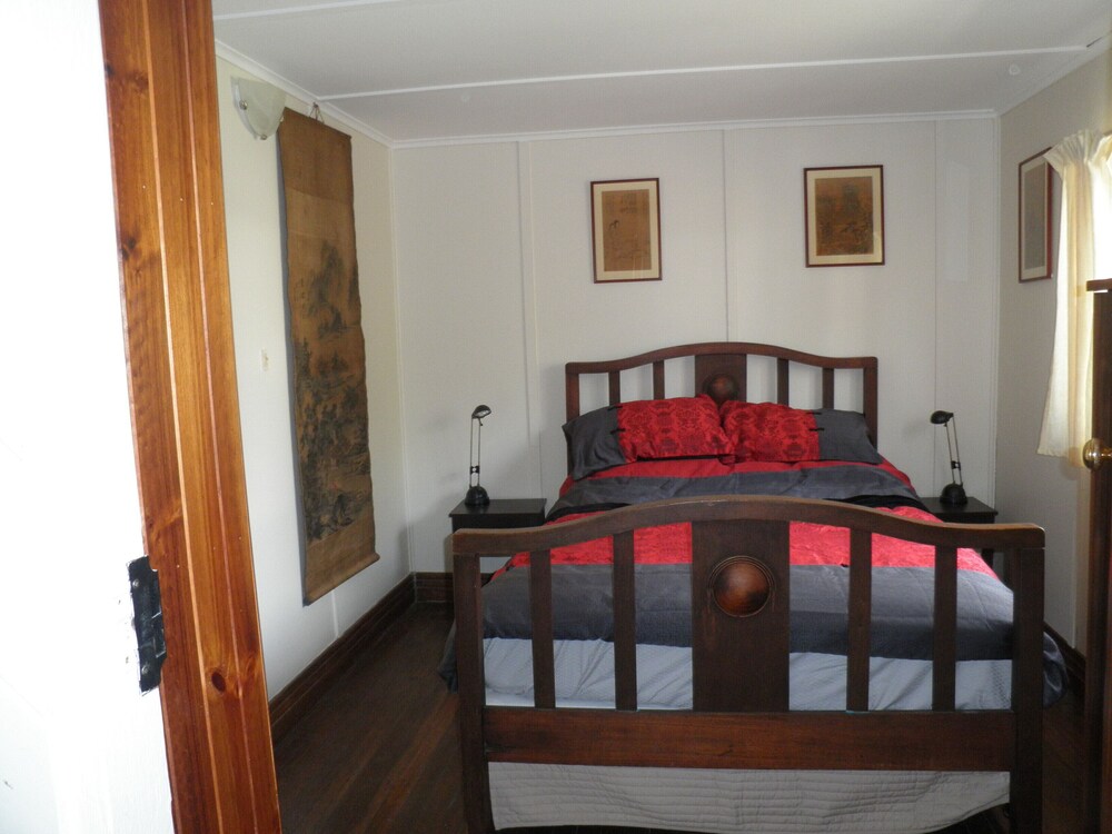 Old style beach house with views of the river joining the ocean : Deals ...