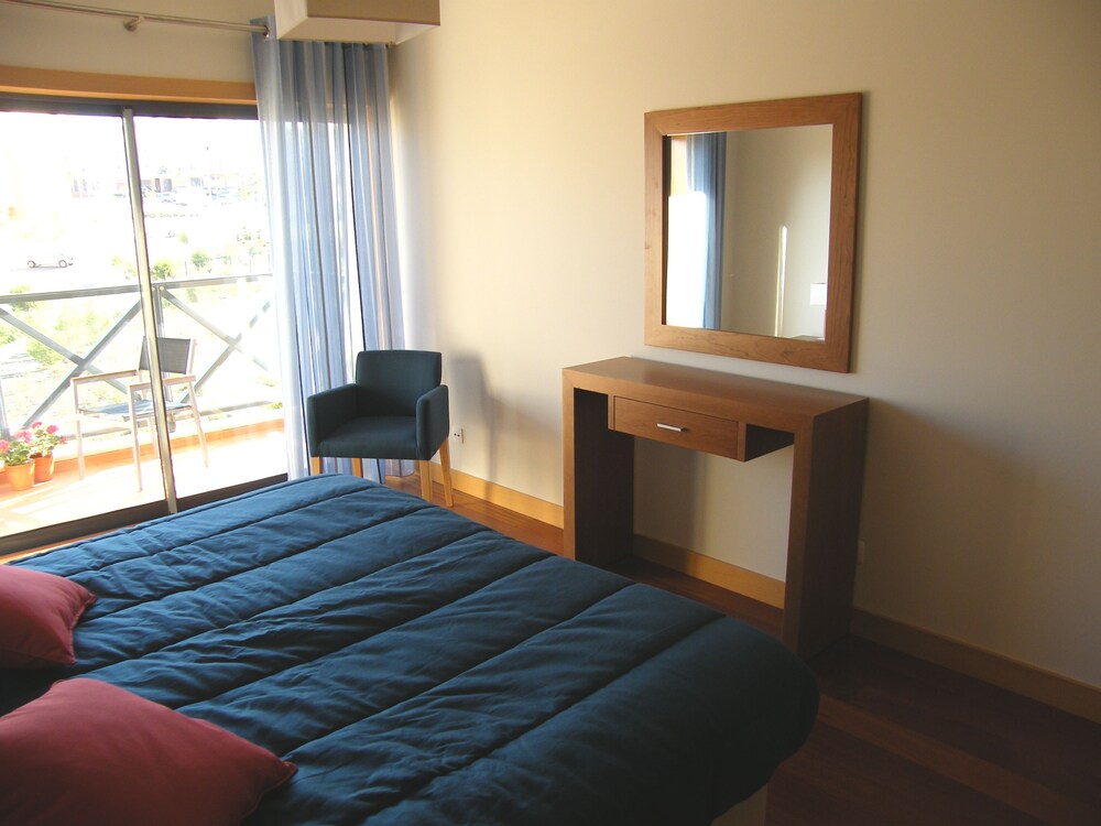 Luxurious spacious apartment with balconies overlooking pool & gardens ...