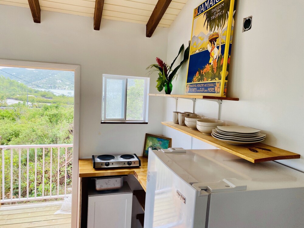 Colorful Caribbean Cottage • King Bed, Pool, Lush Garden Views - Estate ...