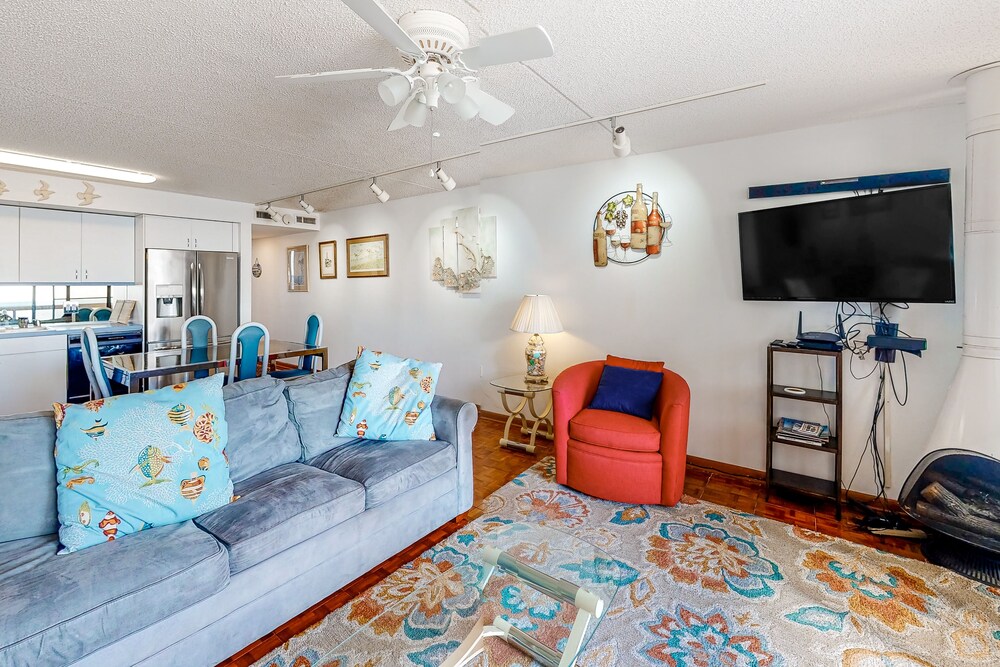 Bright & convenient condo with pool, balcony & angled ocean views ...