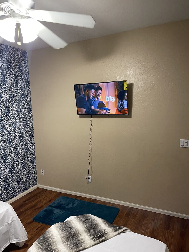 Lovely bedroom beautifully decorated with a smart tv . - Laveen | Vrbo