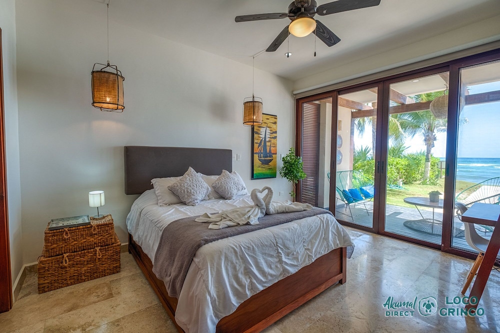 Elegant ground level beachfront condo with pool access, AC and WiFi ...