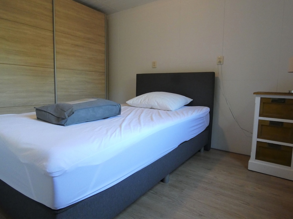 Beautiful wooden chalet for rent against forest - Marum | Vrbo