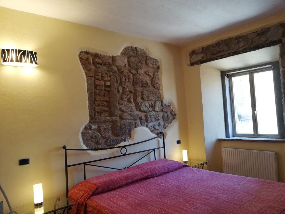 Tuscan Maremma: house in the medieval village of Roccatederighi ...
