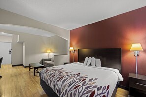 Roupas de cama premium, escrivaninha, cortinas blackout