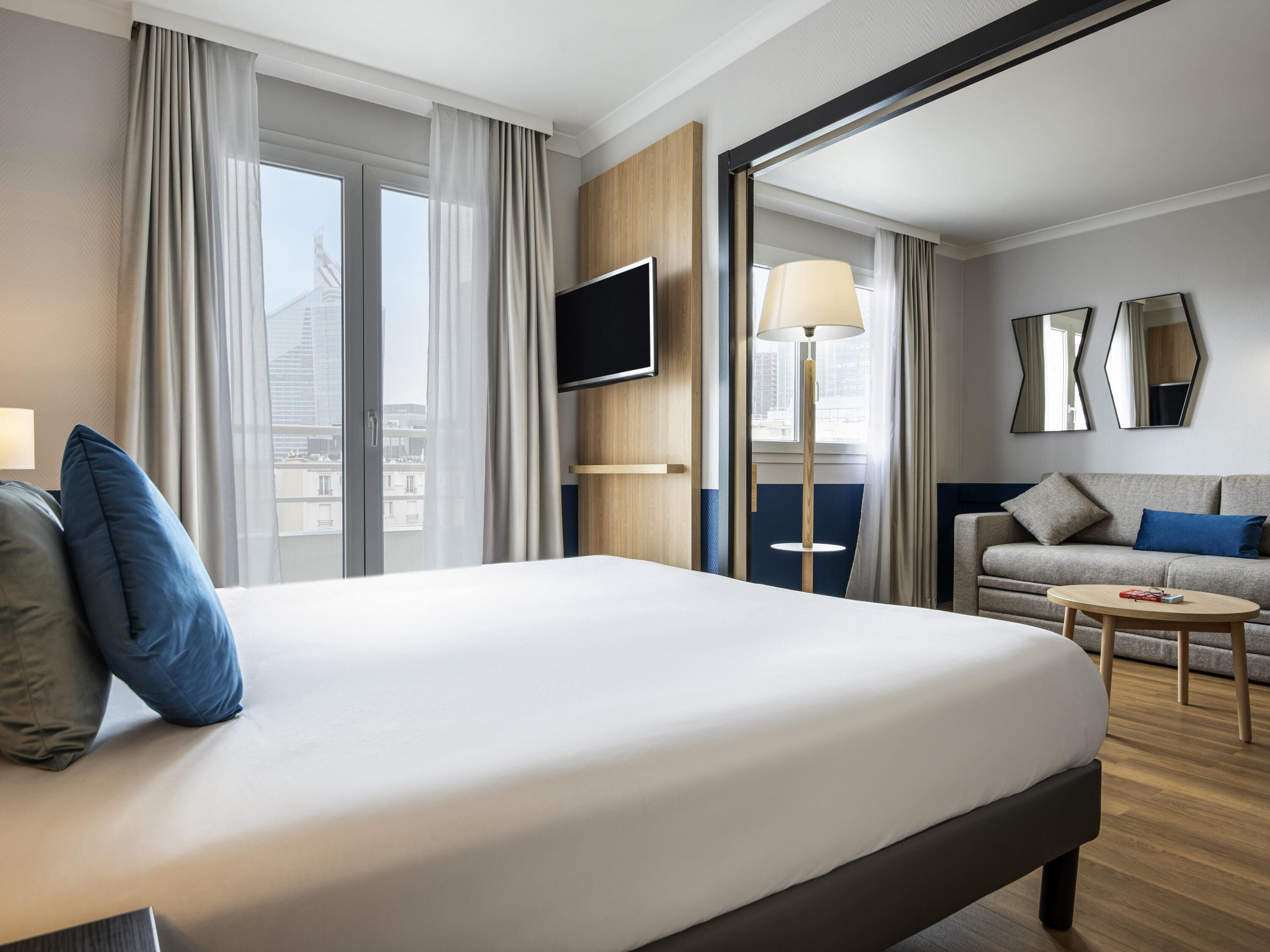 Apartamento, várias camas | Cofre no quarto, secretária, quartos insonorizados 