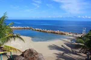 Quarto Superior | Vista para a praia ou o mar