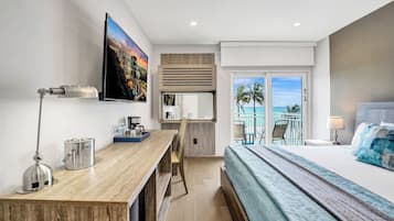 Quarto Premium, 1 cama king-size, junto ao mar | Televisão