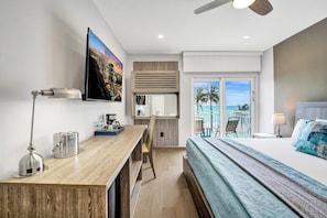 Quarto Premium, 1 cama king-size, junto ao mar | Televisão