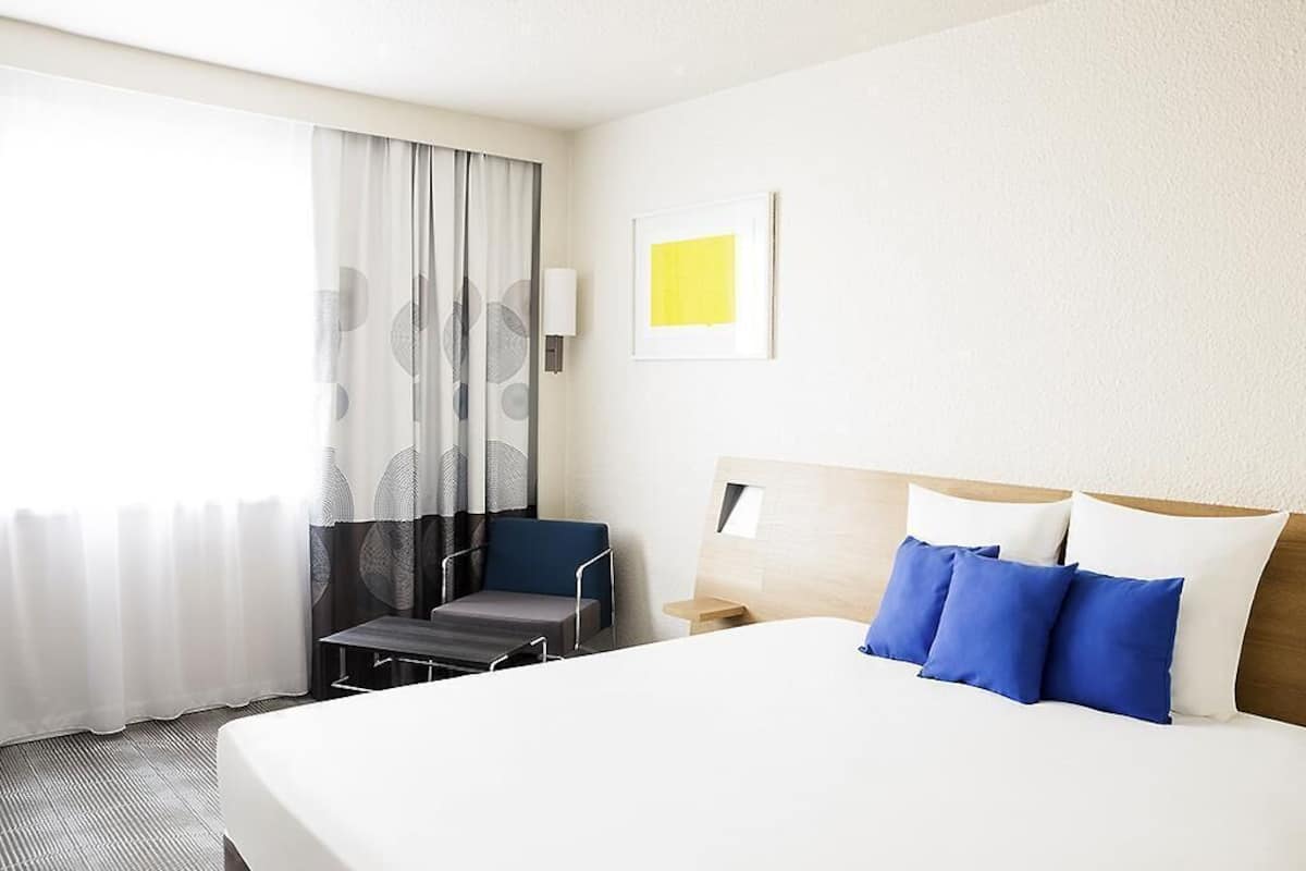 Quarto clássico, 1 cama King | Frigobar (abastecido com itens grátis), cofres nos quartos, escrivaninha