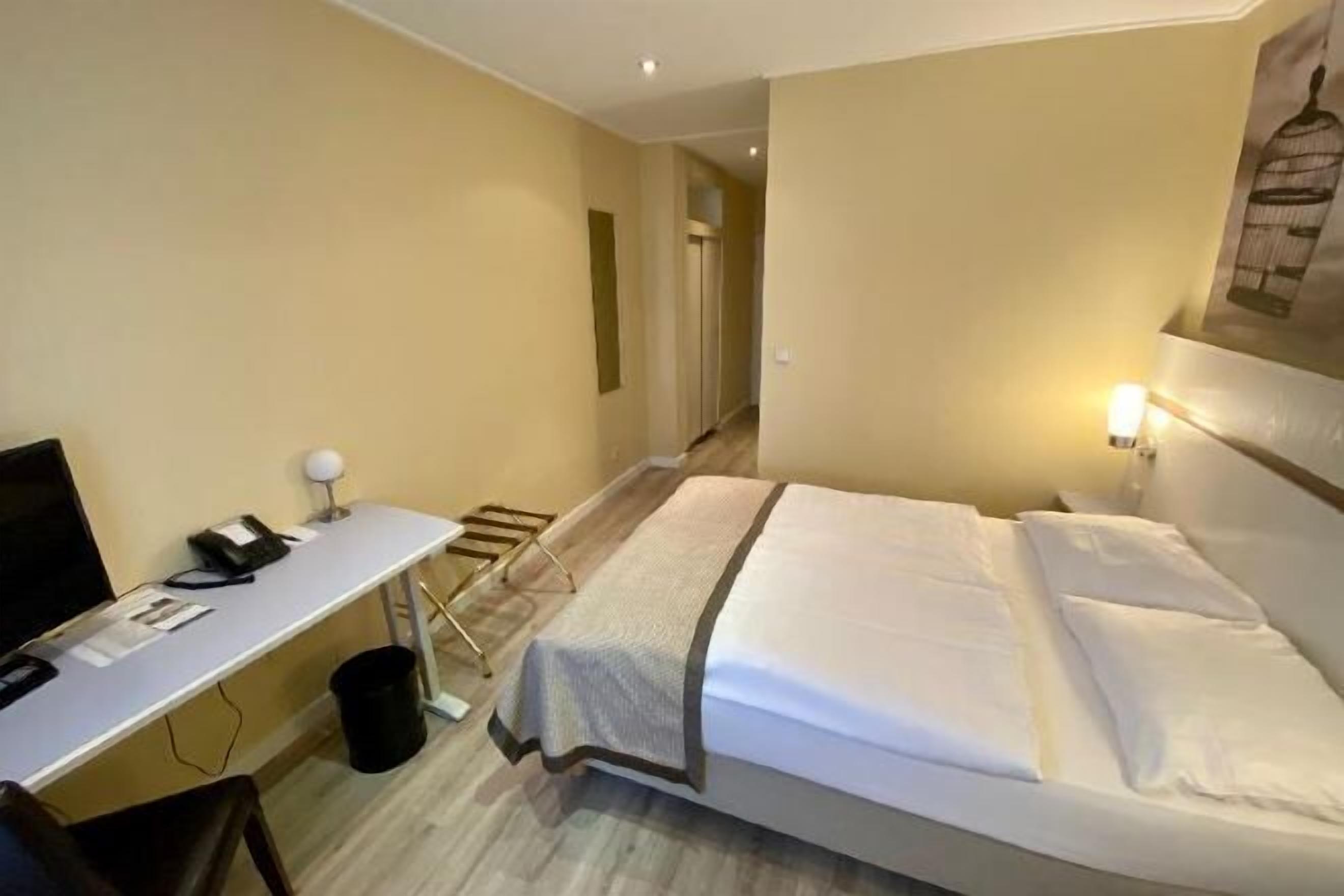 Secretária, quartos insonorizados, ferro/tábua de engomar, Wi-fi grátis 