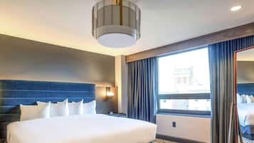 Suíte júnior, 1 cama King | Roupas de cama premium, cofres nos quartos, escrivaninha