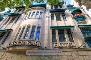 A building with the sign "KAISER KARL HOTEL" indicating it is a hotel.