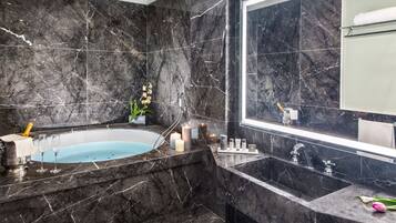 Suite | Banheira de hidromassagem privativa