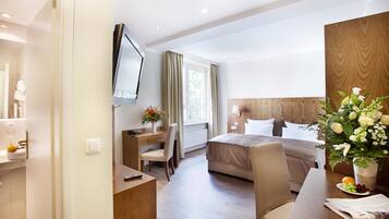 Quarto standard, 2 camas de solteiro | Frigobar, escrivaninha, Wi-Fi de cortesia, roupa de cama