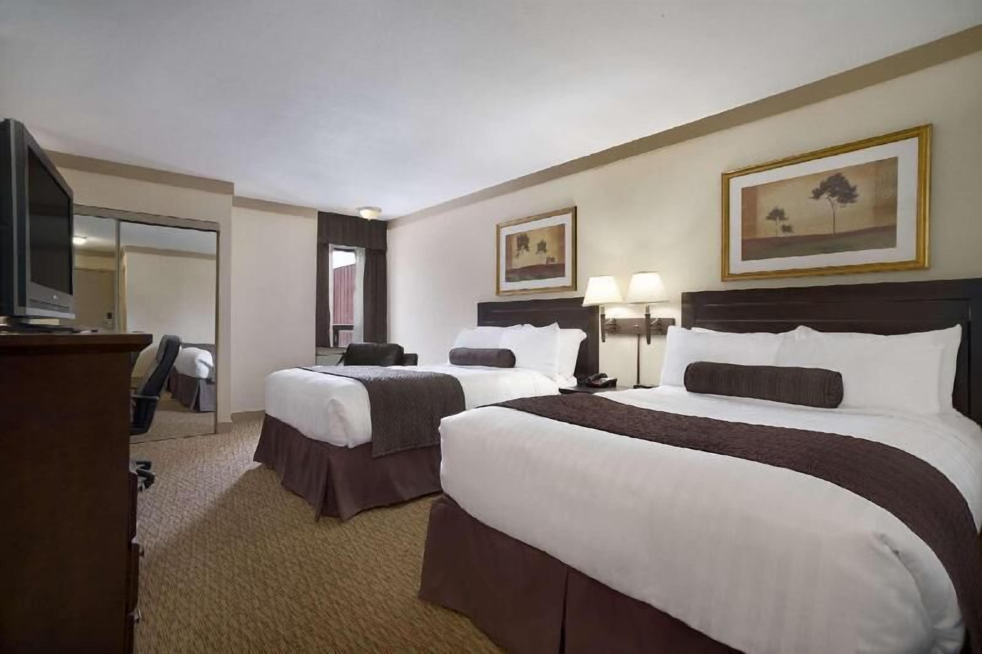 Roupas de cama premium, camas com colchões pillow-top, escrivaninha