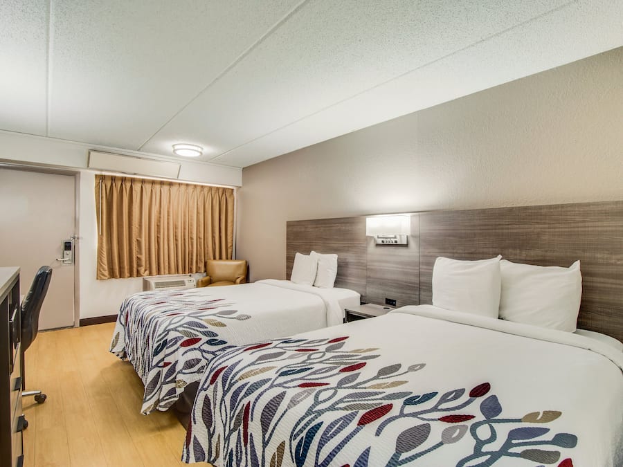 Escrivaninha, cortinas blackout, berços grátis, Wi-Fi de cortesia