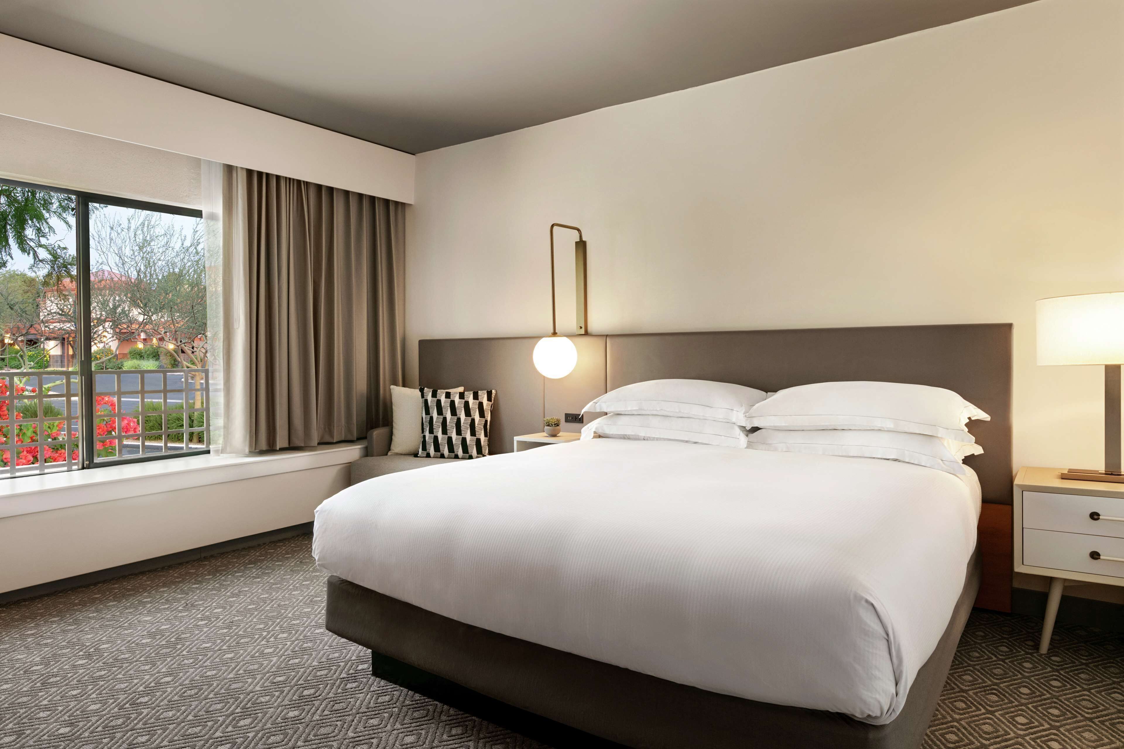 Roupas de cama premium, camas Tempur-Pedic, cofres nos quartos