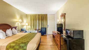 Quarto, 1 cama King, acessível, para não fumantes | Cortinas blackout, ferros/tábuas de passar roupa, Wi-Fi de cortesia