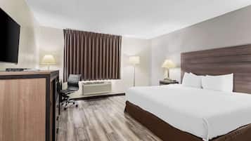 Quarto, 1 cama king-size, acessível | Com mobília individualizada, secretária