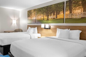 Roupas de cama premium, cofres nos quartos, escrivaninha