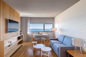 Suite | Roupa de alta qualidade, minibar, cofre com capacidade para portátil 