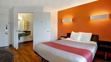 Escrivaninha, cortinas blackout, Wi-Fi de cortesia, roupa de cama