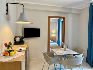 Suite | Sala de estar | Televisor 