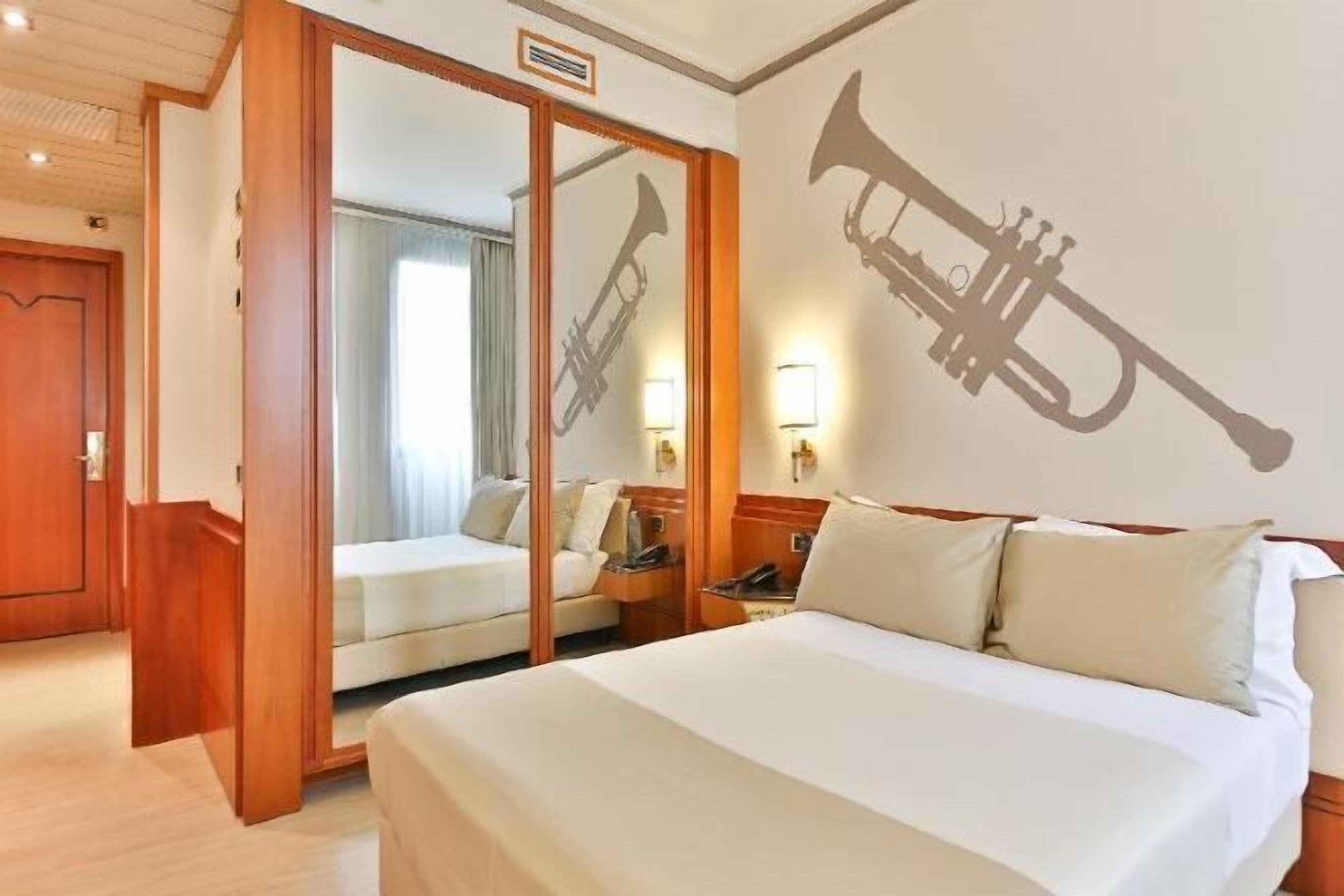 Edredons de pluma, camas com colchões de espuma com sistema de memória