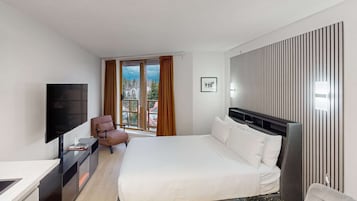 Quarto (Studio,Mountain View) | Área de estar | TV de tela plana 36 polegadas com canais a cabo, TV