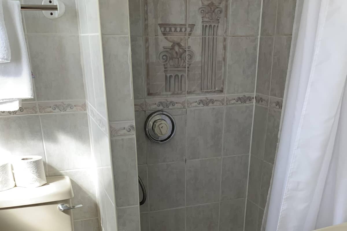 Quarto solteiro, suíte (Partial Coastal View) | Banheiro