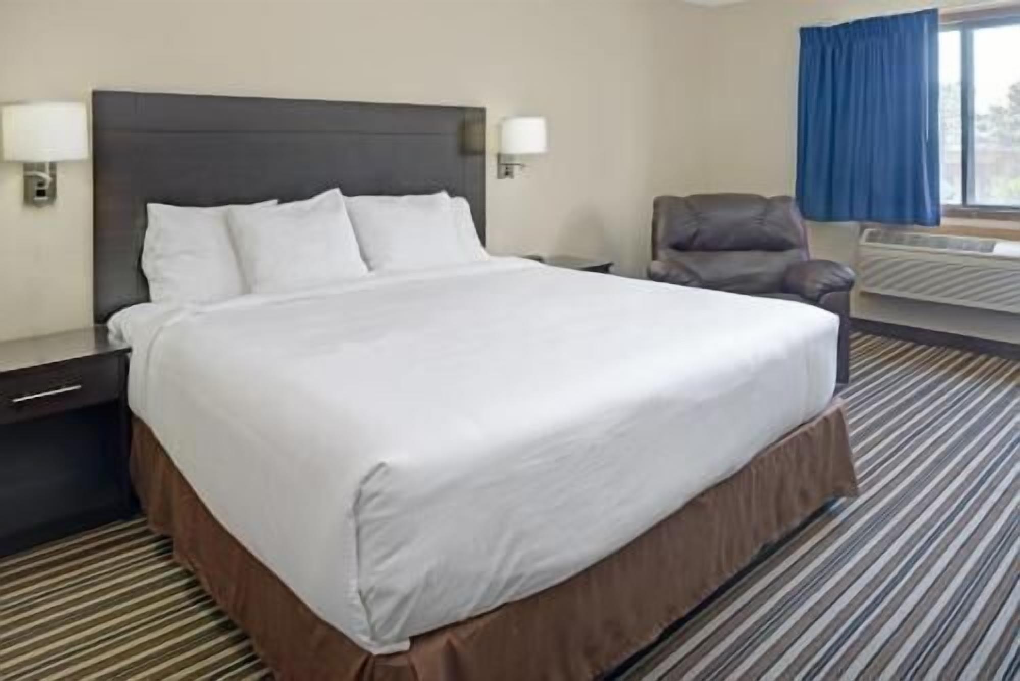 Roupas de cama premium, camas com colchões pillow-top, escrivaninha