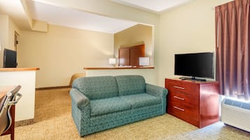 Suite, 1 cama king-size, não fumadores | Cofre no quarto, secretária, ferro/tábua de engomar, Wi-fi grátis