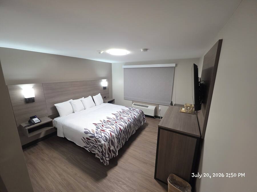 Quarto luxo, 1 cama King, para não fumantes | Escrivaninha, cortinas blackout, Wi-Fi de cortesia, roupa de cama