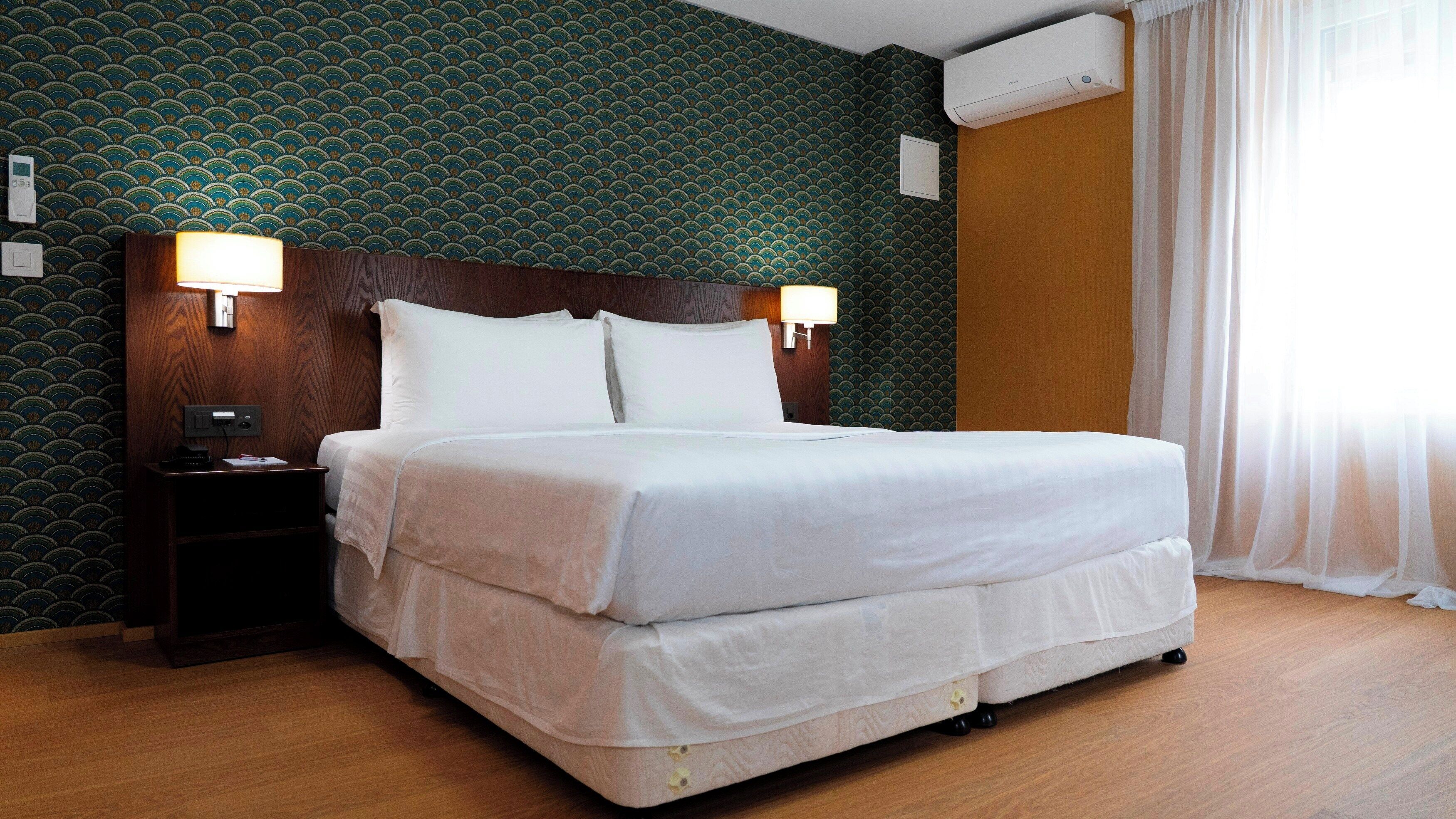 Suíte júnior | Frigobar, cofres nos quartos, escrivaninha, Wi-Fi de cortesia