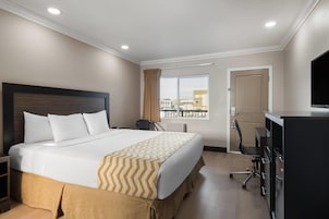Quarto standard, 1 cama King, para não fumantes | Camas extras/dobráveis (sobretaxa), Wi-Fi de cortesia, roupa de cama