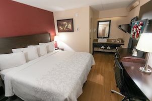Quarto Deluxe, 1 cama king-size (Smoke Free) | Roupa de alta qualidade, camas de colchão pillowtop, cofre no quarto 