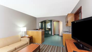 Suite, 1 cama king-size, não fumadores (One-Bedroom) | Secretária, ferro/tábua de engomar, berços/camas para crianças grátis