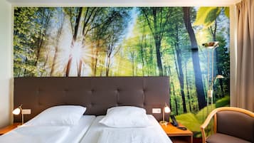 Cofres nos quartos, cortinas blackout, Wi-Fi de cortesia, roupa de cama