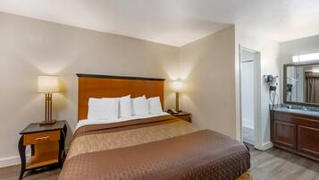 Quarto Standard, 1 cama king-size, não fumadores | Ferro/tábua de engomar, Wi-fi grátis, roupa de cama fornecida