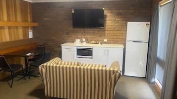 Quarto família | Área de estar | Smart TV 50 polegadas com canais digitais