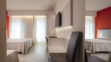 Quarto triplo | Frigobar, cofres nos quartos, escrivaninha, cortinas blackout