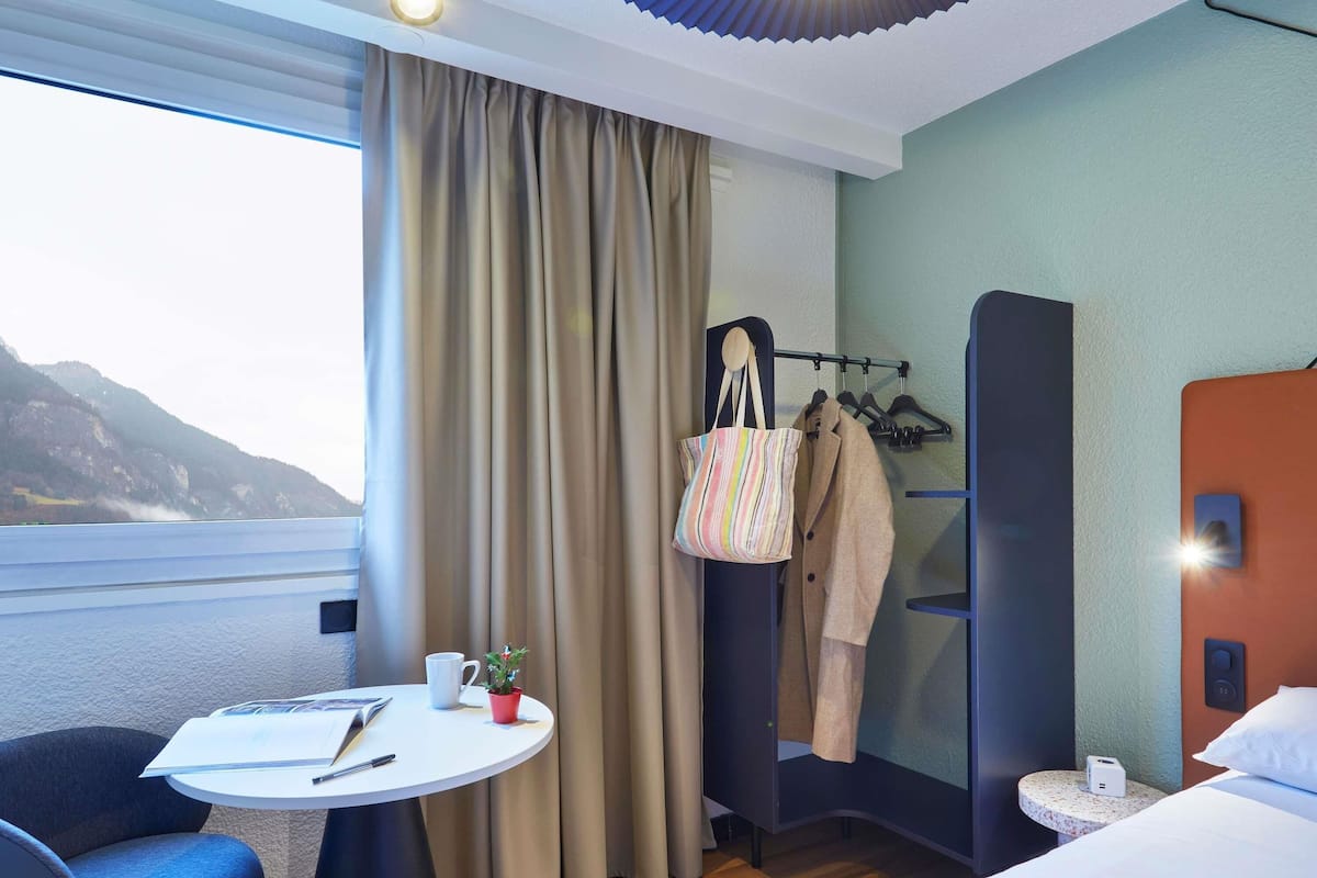 Quartos insonorizados, ferro/tábua de engomar, Wi-fi grátis