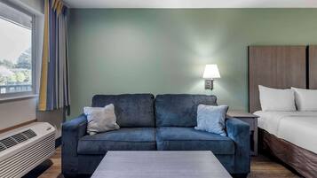 Suite, 1 cama king-size, não fumadores | Camas de colchão pillowtop, cofre no quarto, secretária