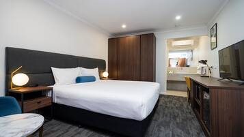 Quarto luxo | Roupas de cama premium, edredons de pluma, frigobar, cofres nos quartos
