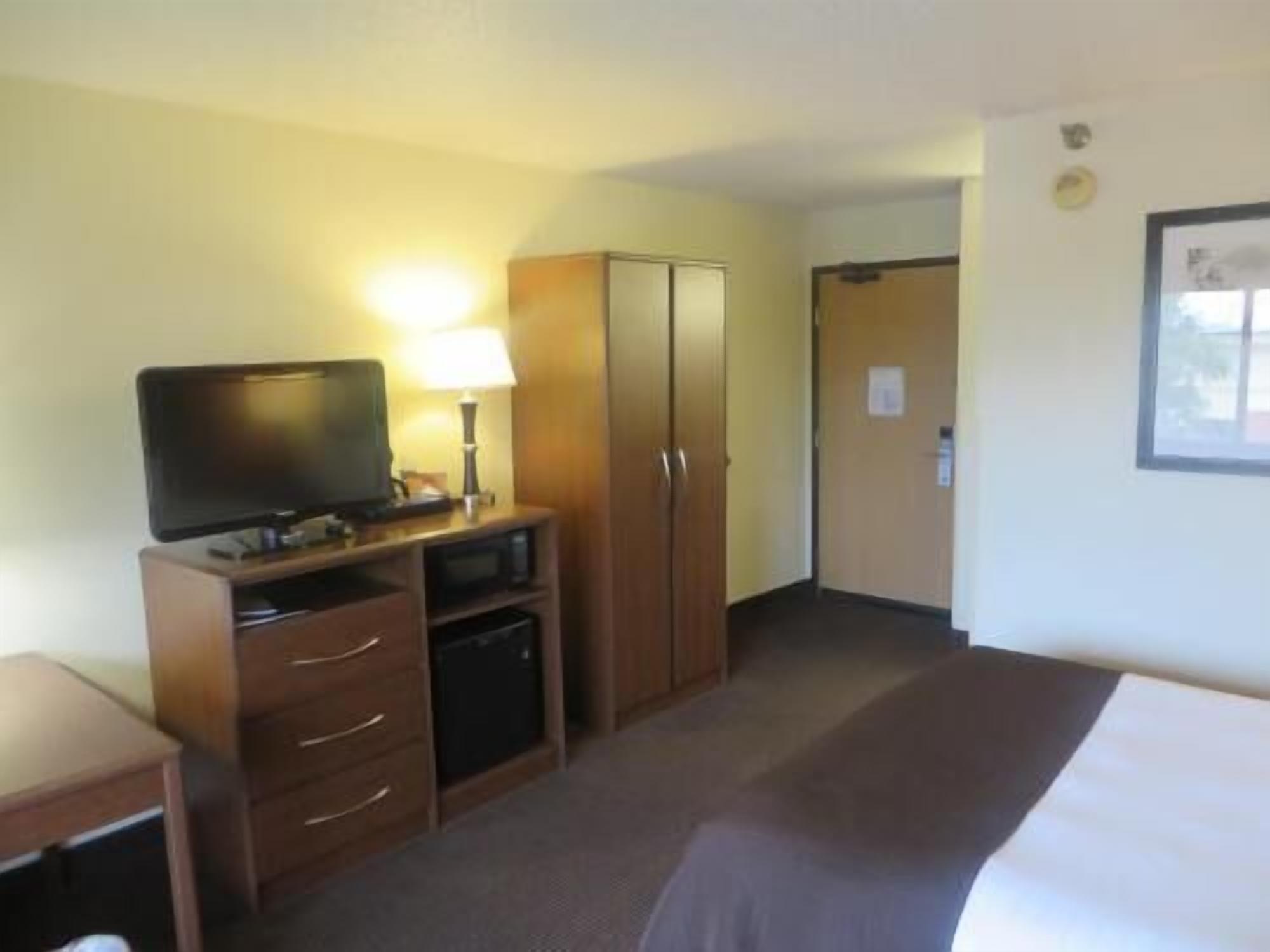 Secretária, secretária adequada para computadores portáteis 