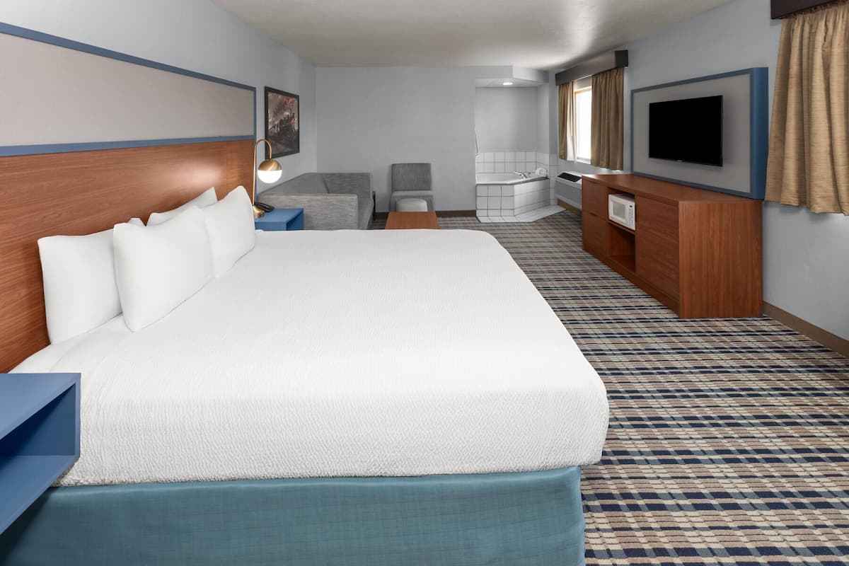 Suíte luxo, 1 cama King, para não fumantes (One-Bedroom) | Banheira de hidromassagem